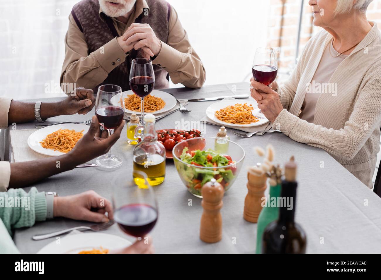Senior women having lunch together hi-res stock photography and images ...