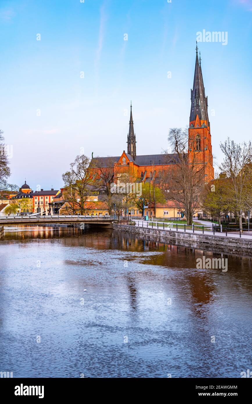 Sunset view of Uppsala cathedral reflecting on river Fyris in Sweden Stock Photo - Alamy
