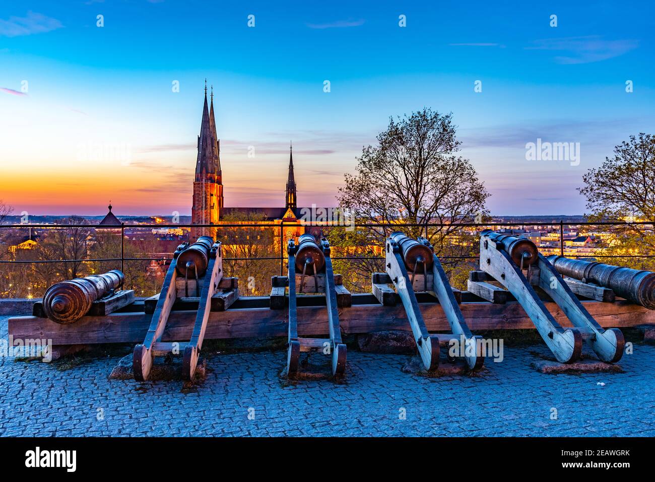 Sunset view of cannons aiming at the cathedral in Uppsala, Sweden Stock ...