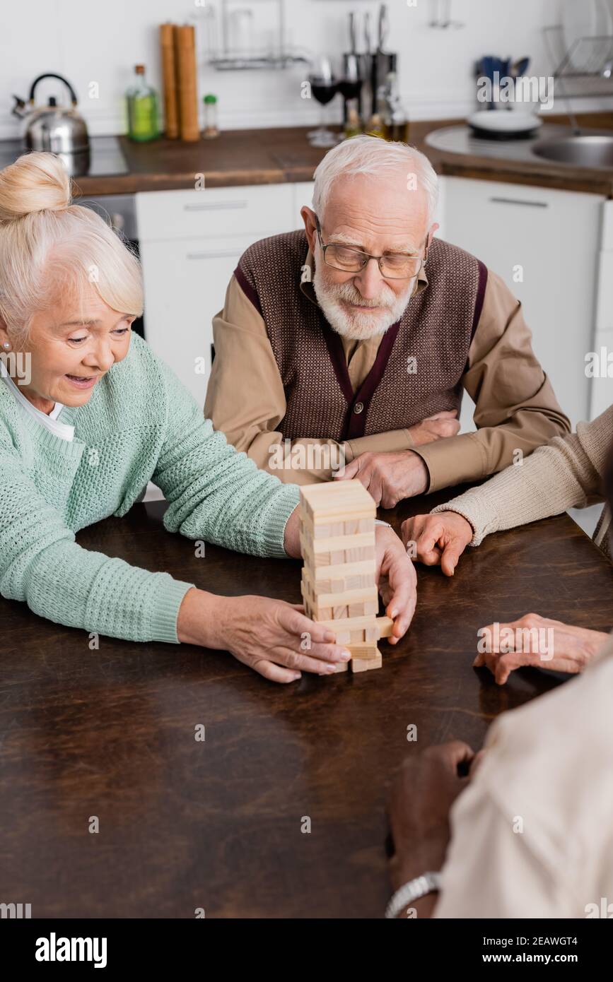 Senior women friends playing game hi-res stock photography and images ...