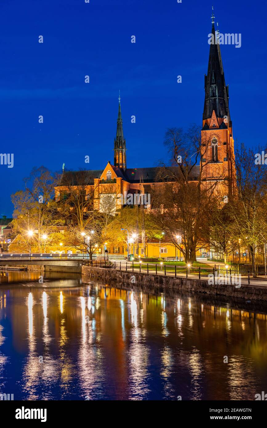 Sunset view of Uppsala cathedral reflecting on river Fyris in Sweden Stock Photo - Alamy