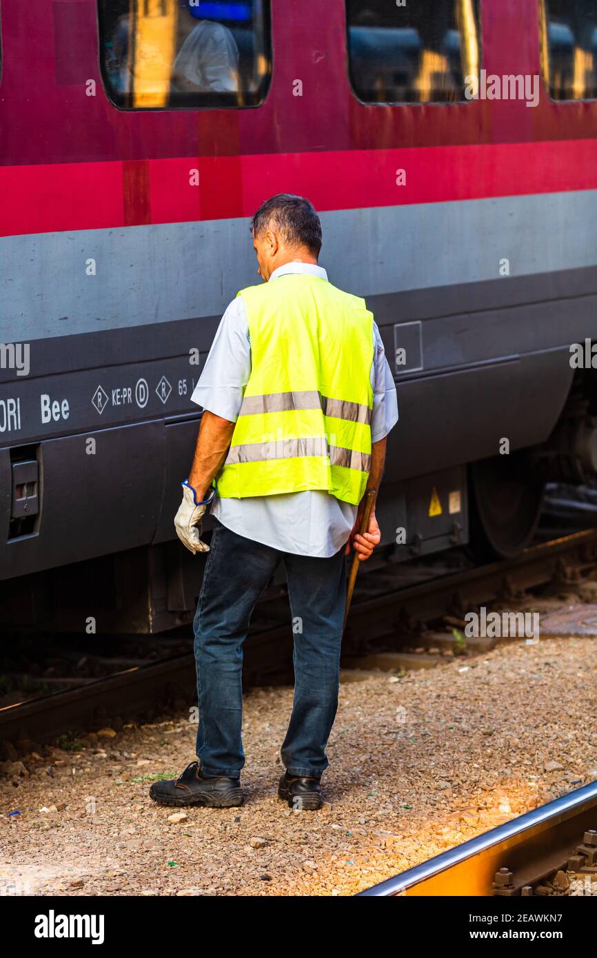 Train crew man doing checkings on the platform at the Bucharest North ...