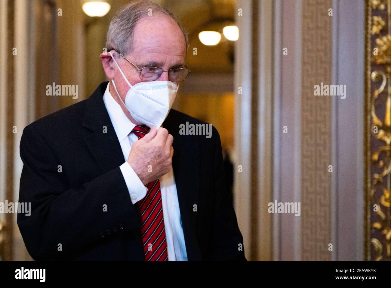 WASHINGTON, DC - FEBRUARY 10: U.S. Senator James Risch (R-ID) adjusts ...
