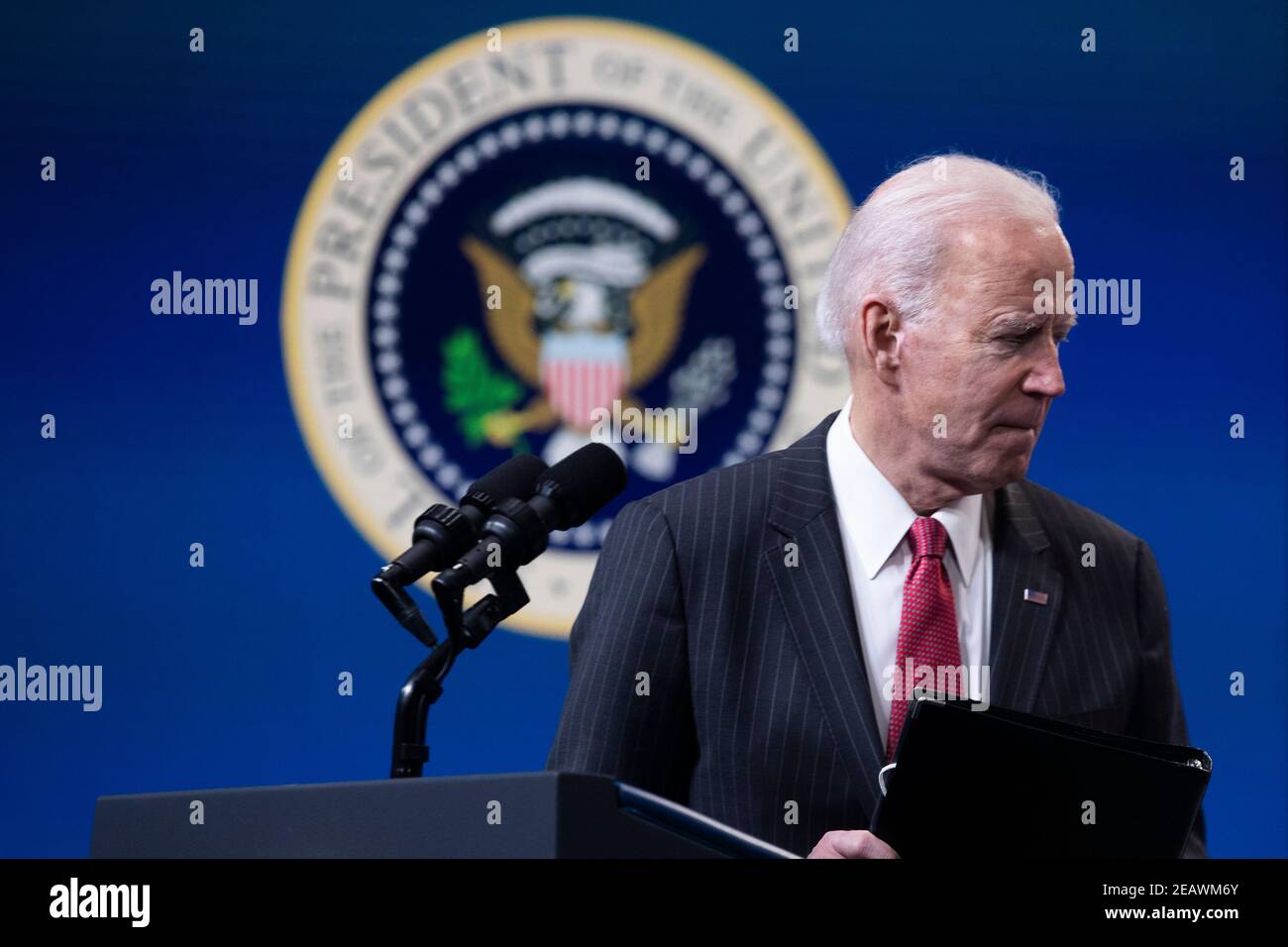 Washington, DC, USA. 10th Feb, 2021. US President Joe Biden turns away ...