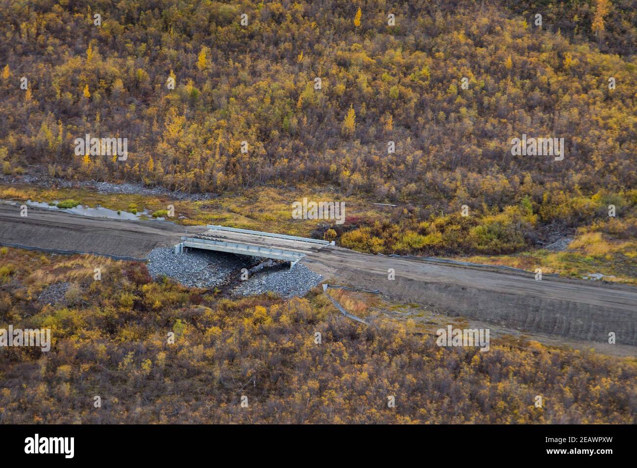 Aerial view of one of eight bridges along the gravel Inuvik-Tuktoyaktuk ...