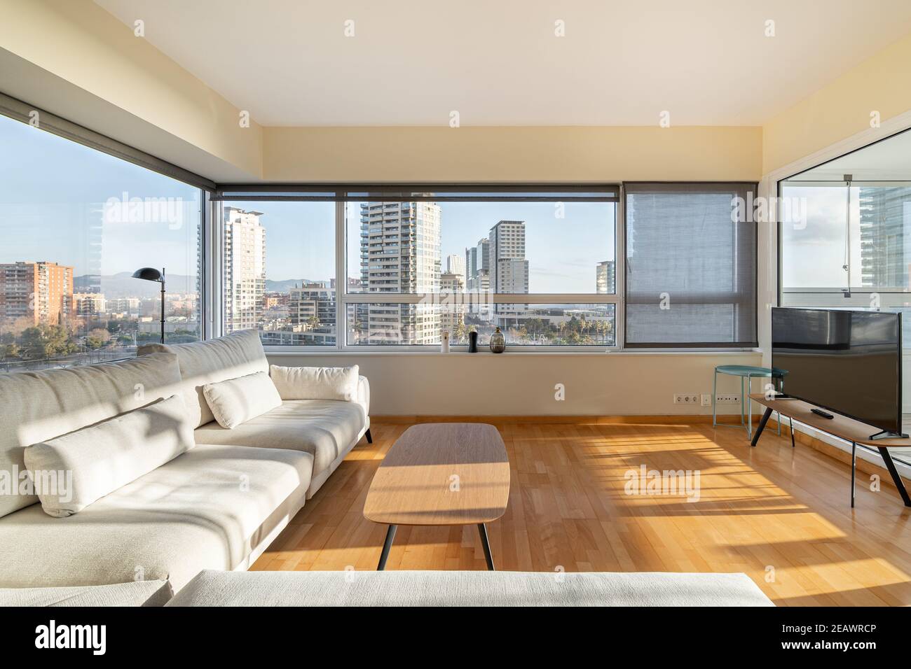 Sunny living room with big windows in the morning with panoramic view ...