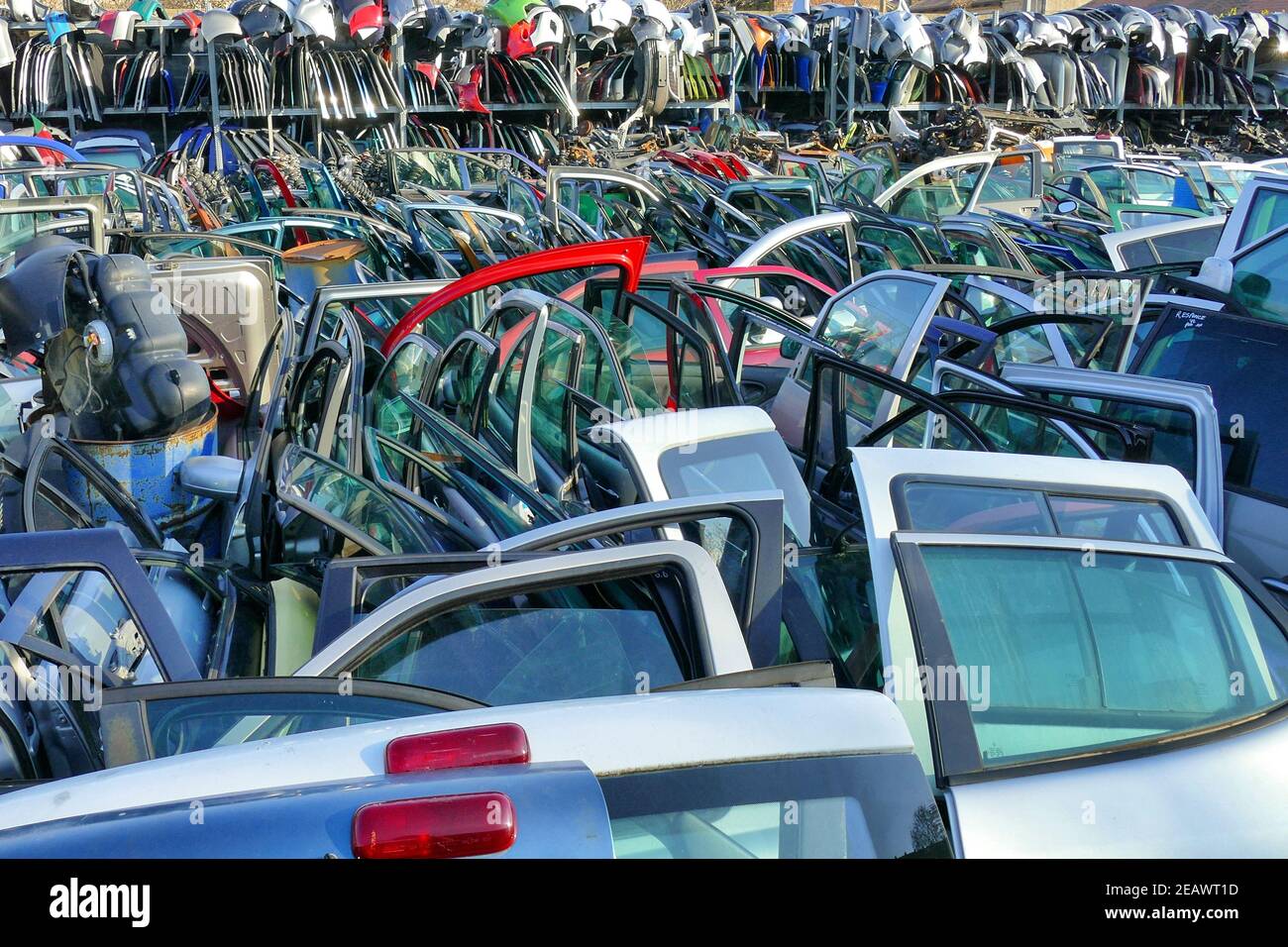 Broken car doors for spare use abandoned Stock Photo - Alamy