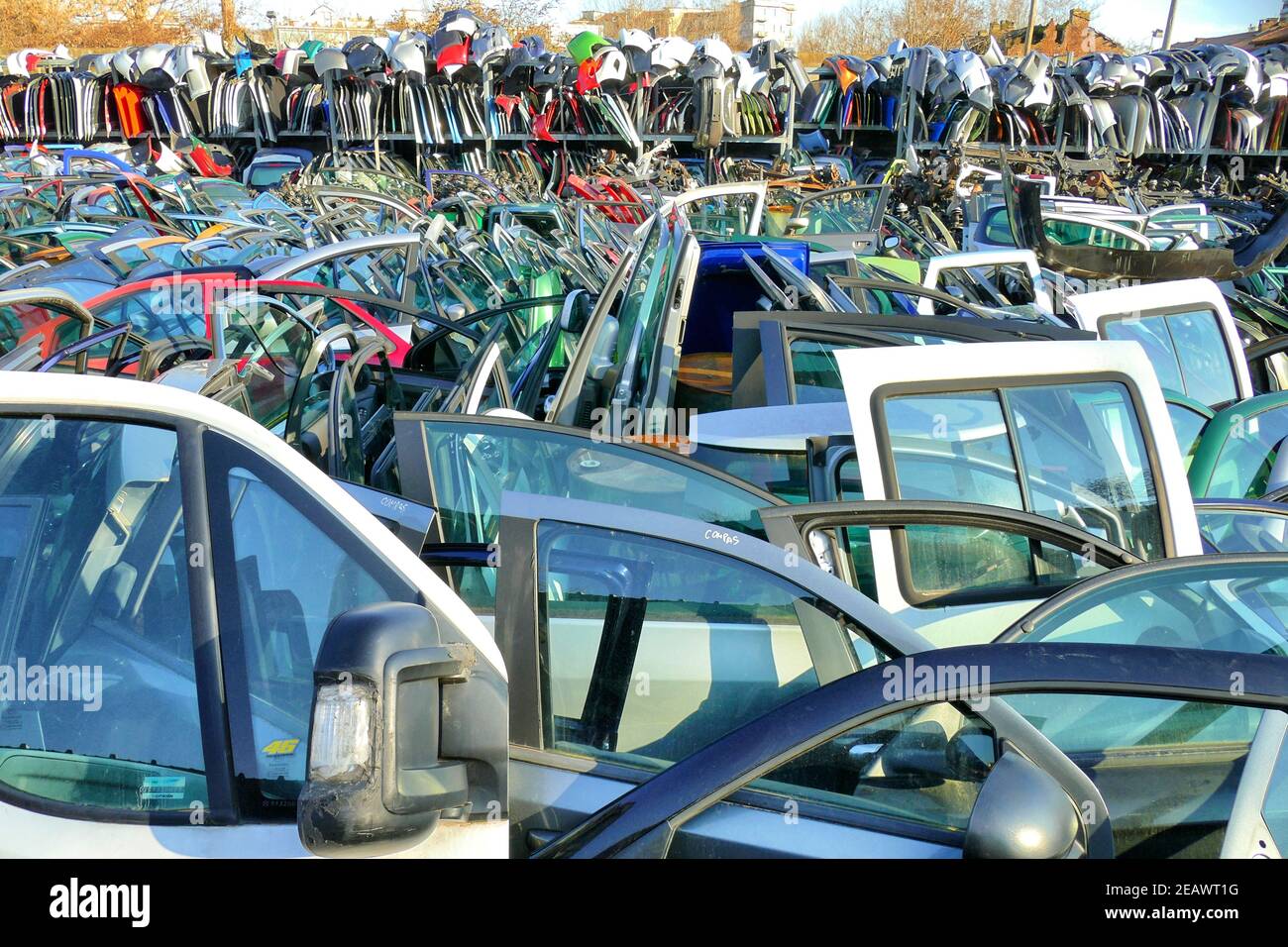 Broken car doors for spare use abandoned Stock Photo - Alamy