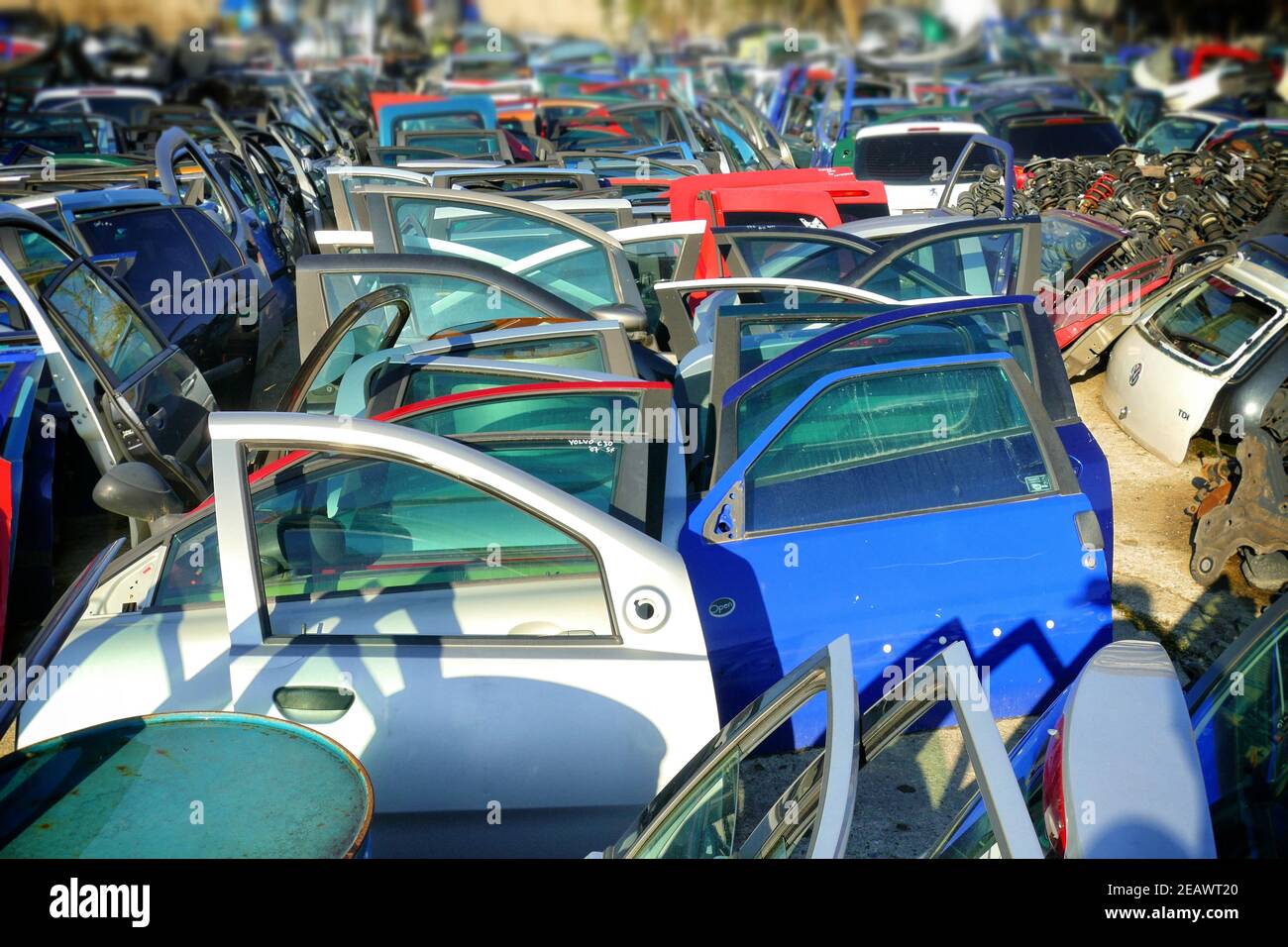 Broken car doors for spare use abandoned Stock Photo - Alamy