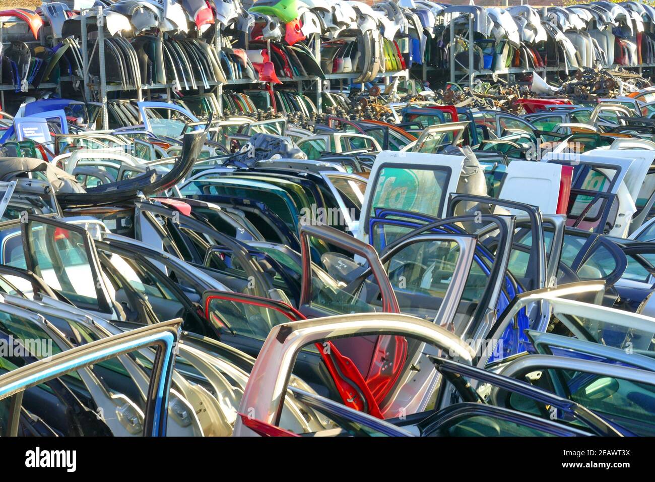Broken car doors for spare use abandoned Stock Photo - Alamy