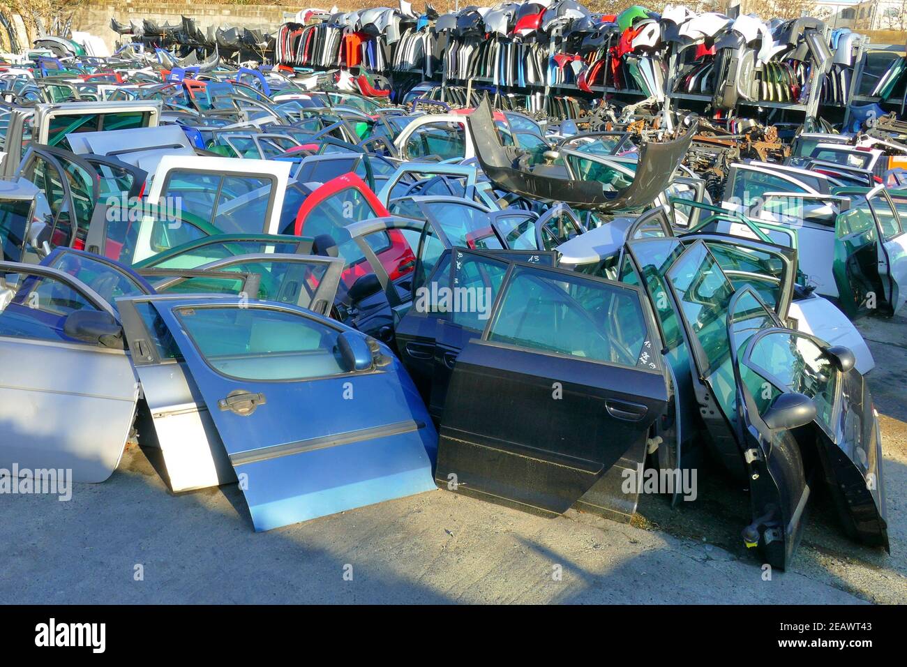 Broken car doors for spare use abandoned Stock Photo - Alamy