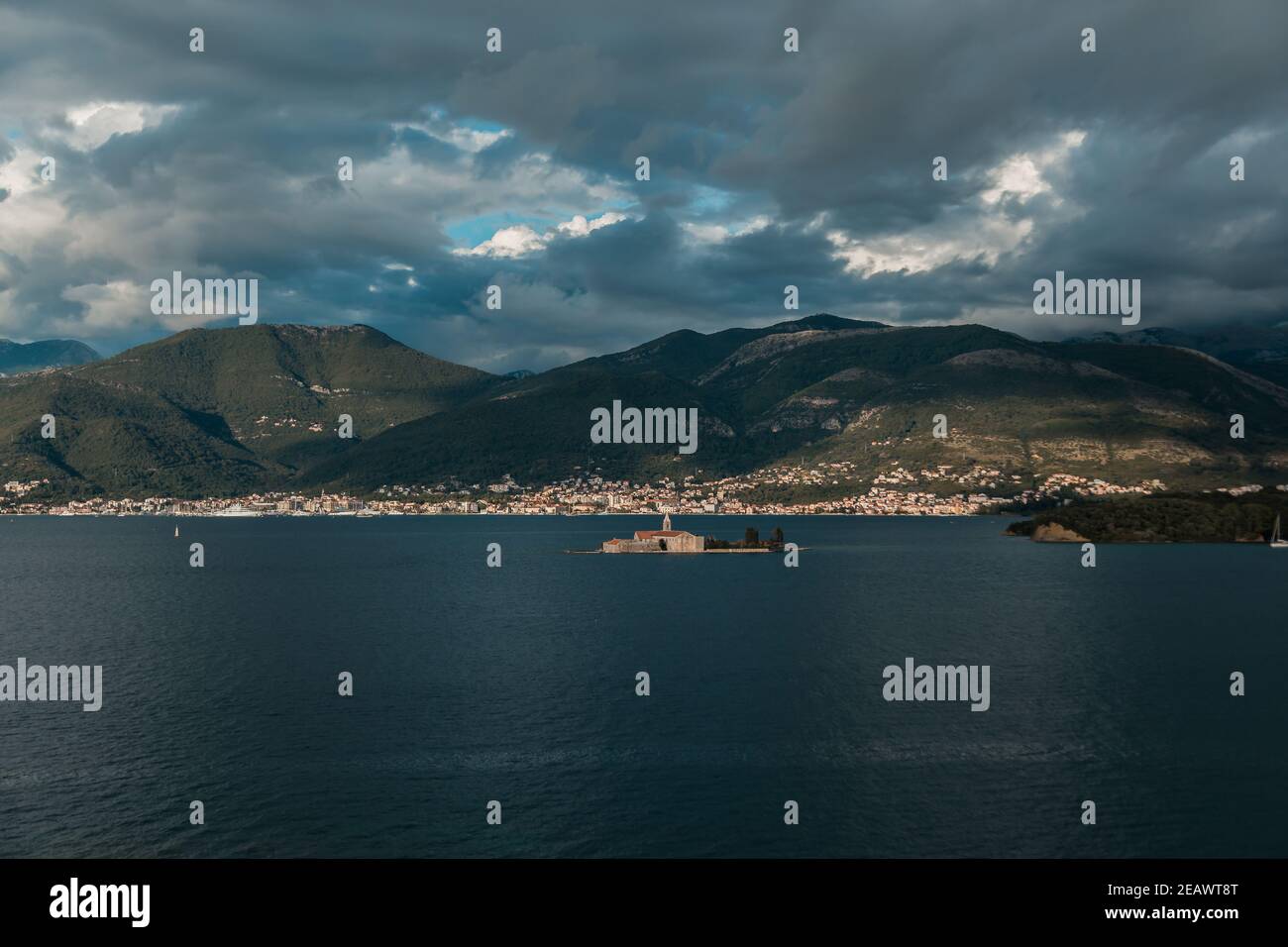 Medieval church on an island in the sea in Montenegro on the background ...