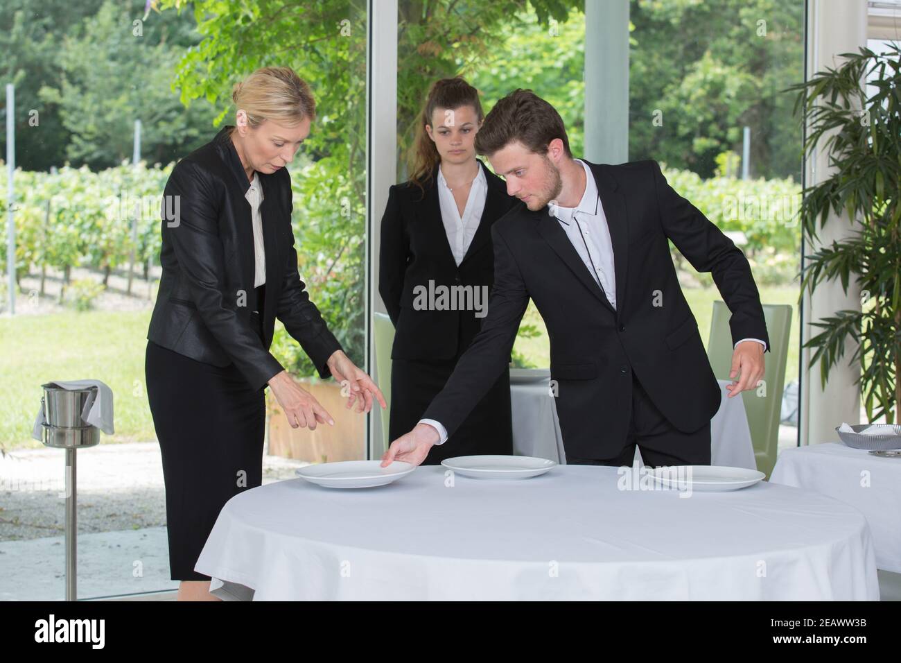 team of waiters at a prestigious restaurant Stock Photo - Alamy