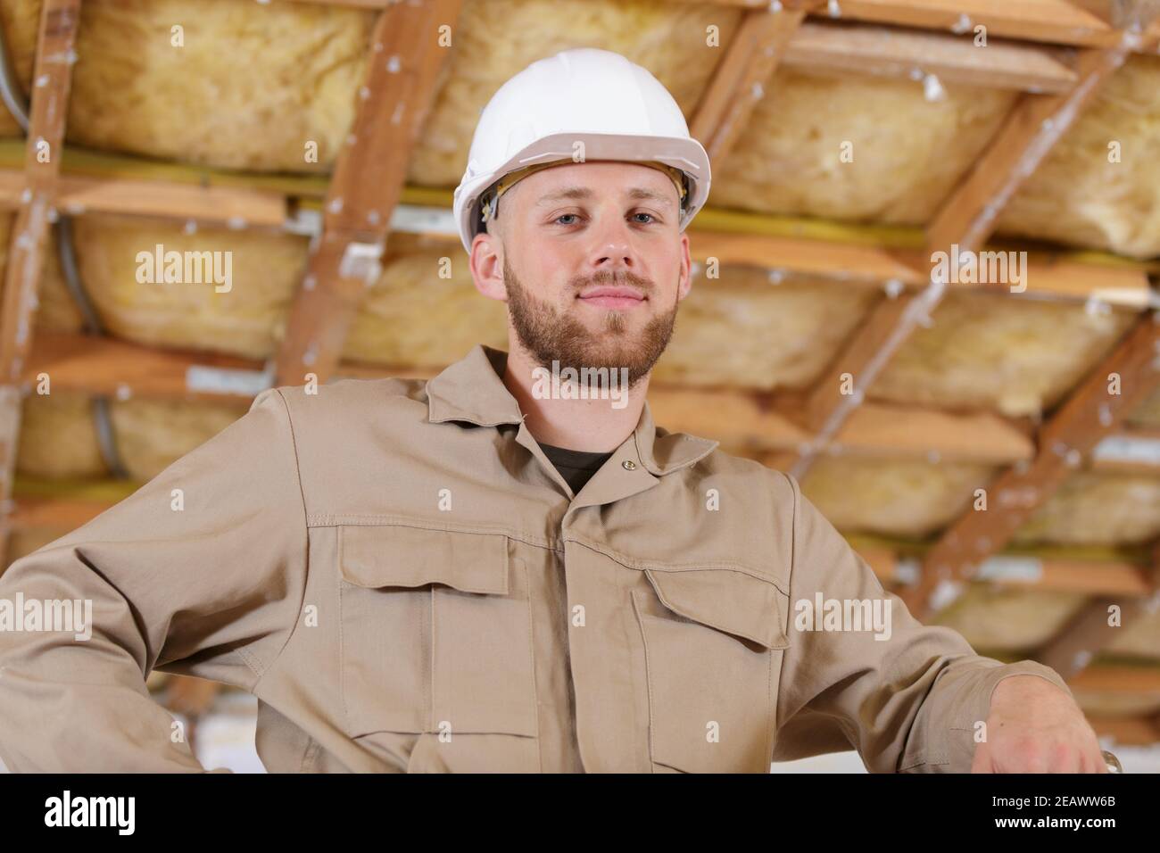 male builder looking at camera Stock Photo - Alamy