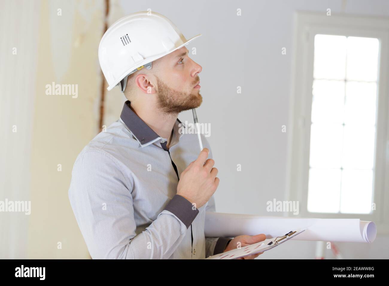 Architect thinking hi-res stock photography and images - Alamy