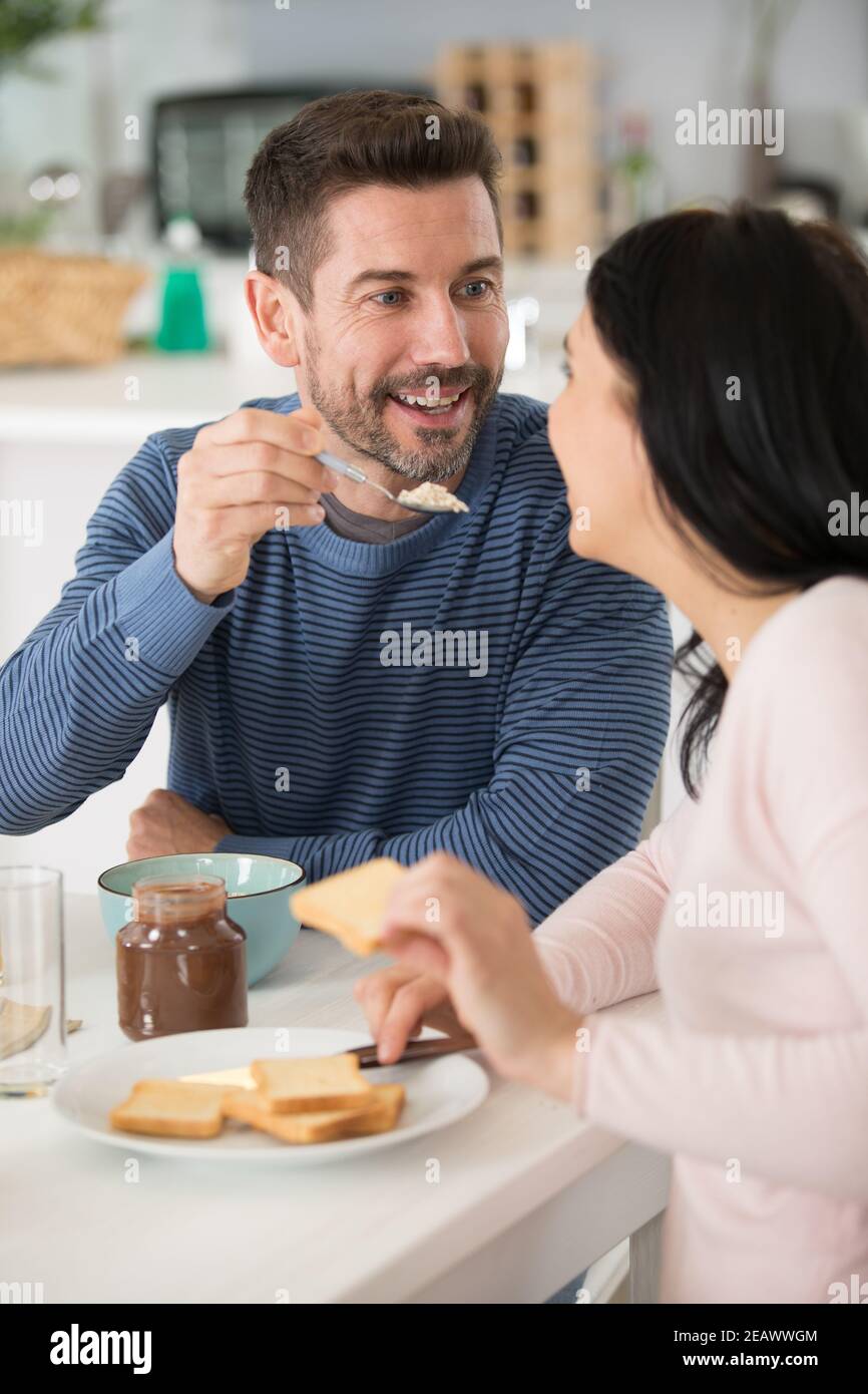 couple sharing breakfast Stock Photo - Alamy