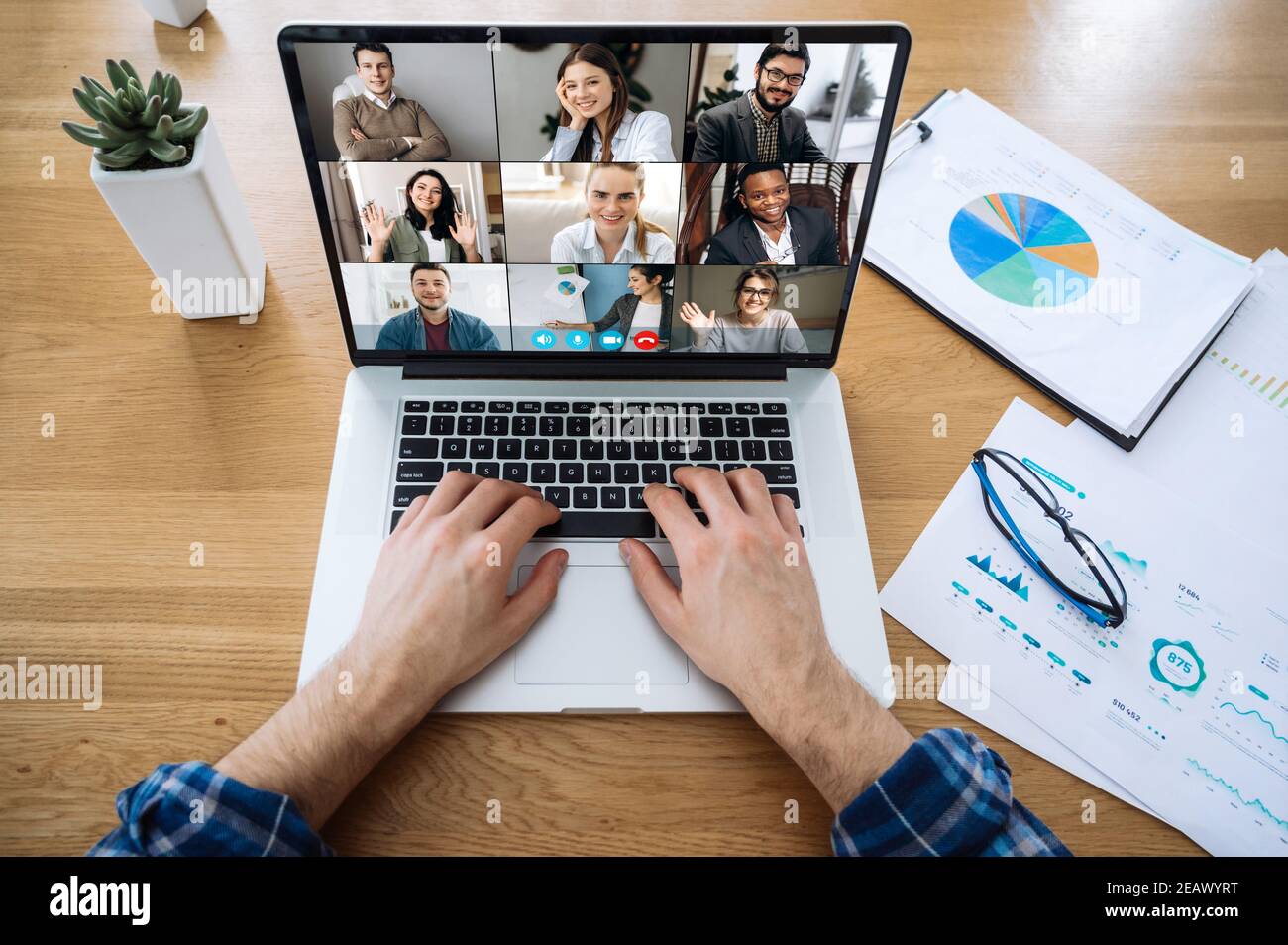 Online business meeting. Top view to the laptop screen with many ...