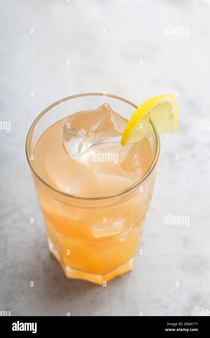 Kombucha cocktail with ice, prepared with fermenting tea with symbiotic ...