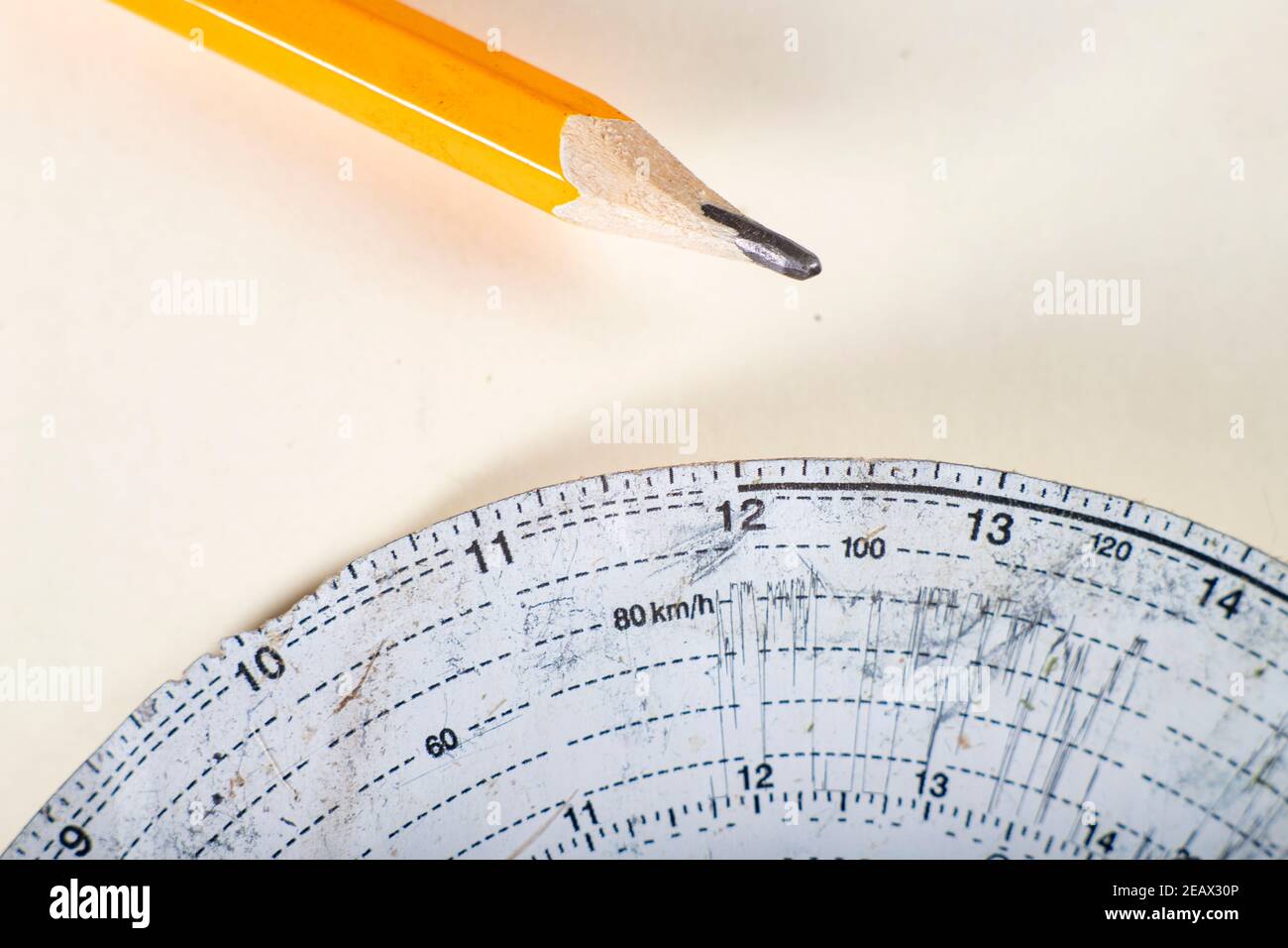 Tachograph chart and pencil for recording the time and mileage of a ...