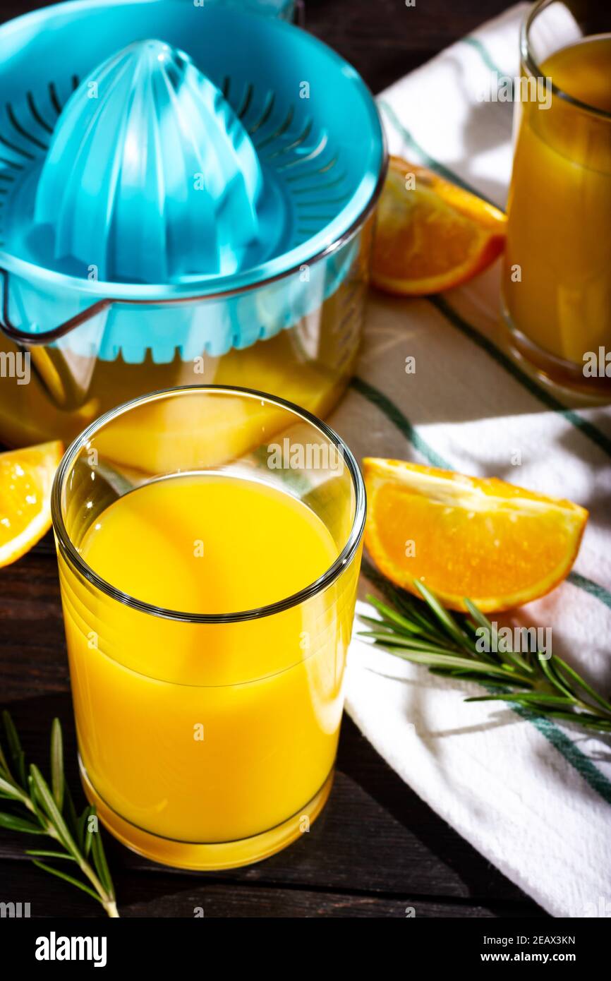 A glass of orange juice. Cooking orange juice Stock Photo - Alamy