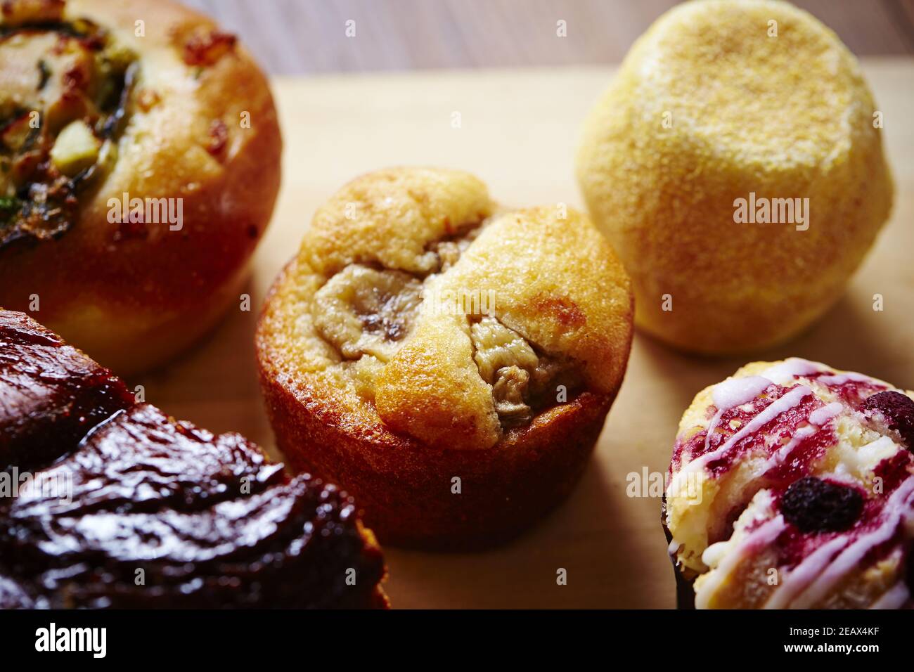Closeup of tasty different flavored muffins Stock Photo - Alamy