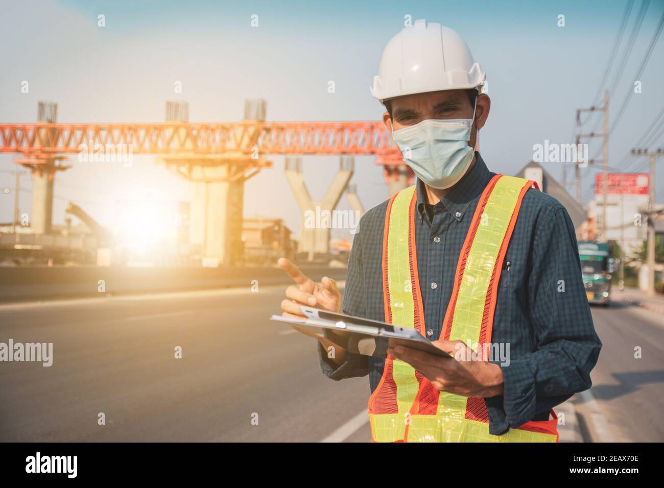 Architecture Engineer man work in building site construction ...