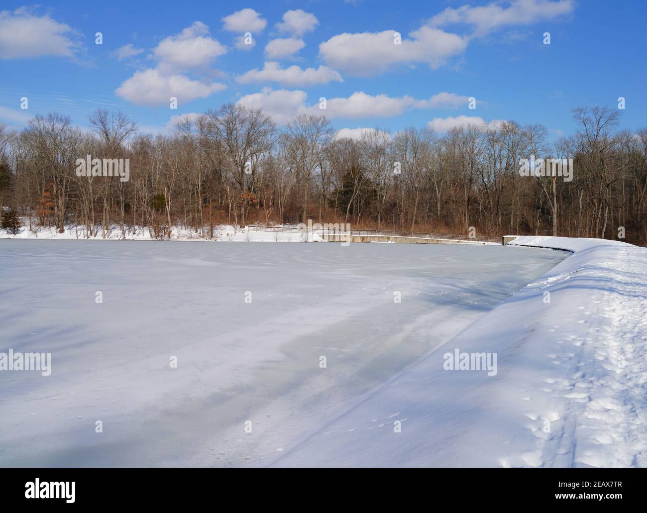 Snowy day view of the frozen lake at the Mountain Lakes Preserve in ...
