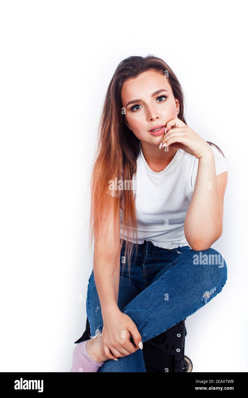 young blond woman on white backgroung gesture thumbs up, isolated ...