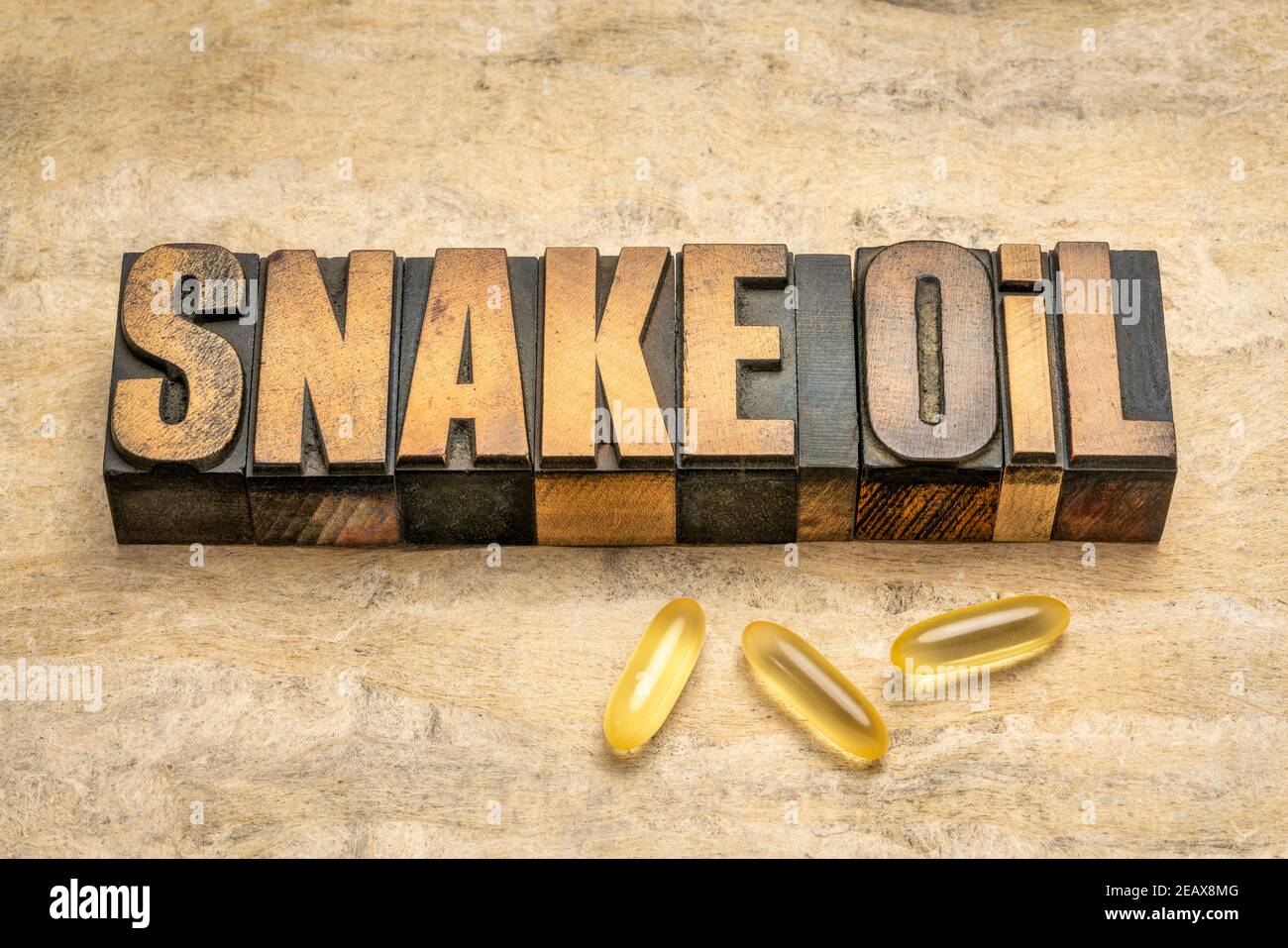 snake oil word abstract in vintage letterpress wood type, Chinese ...