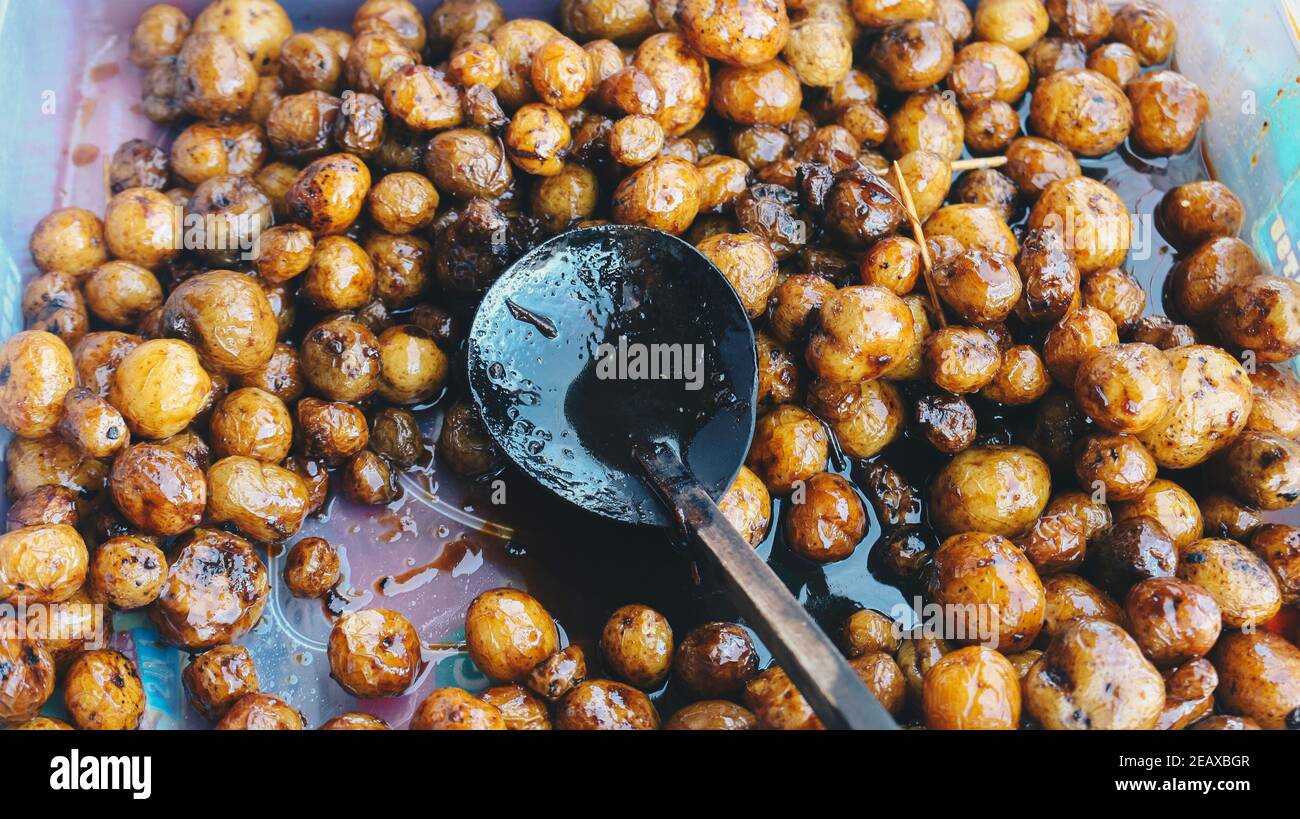 Semur kentang from potato with black sugar. Indonesia traditional food ...