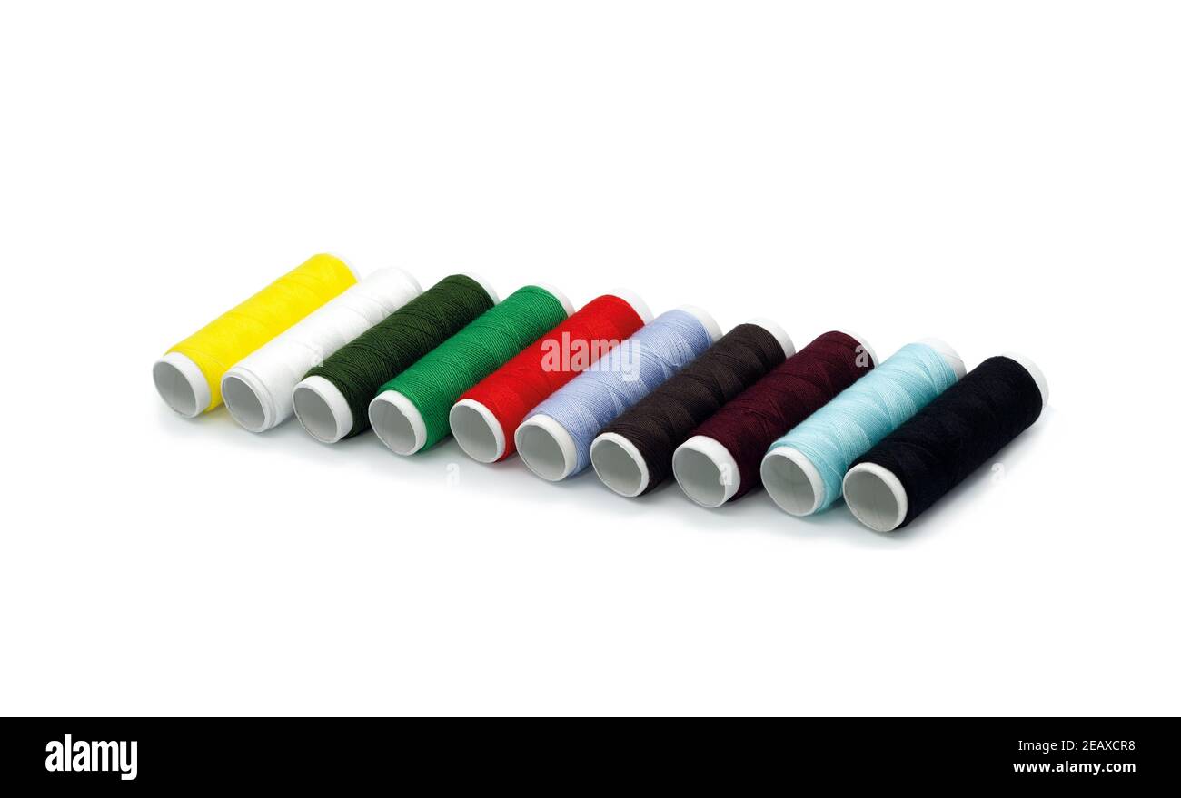 Set of colored thread. Close-up. Isolated over white background Stock ...