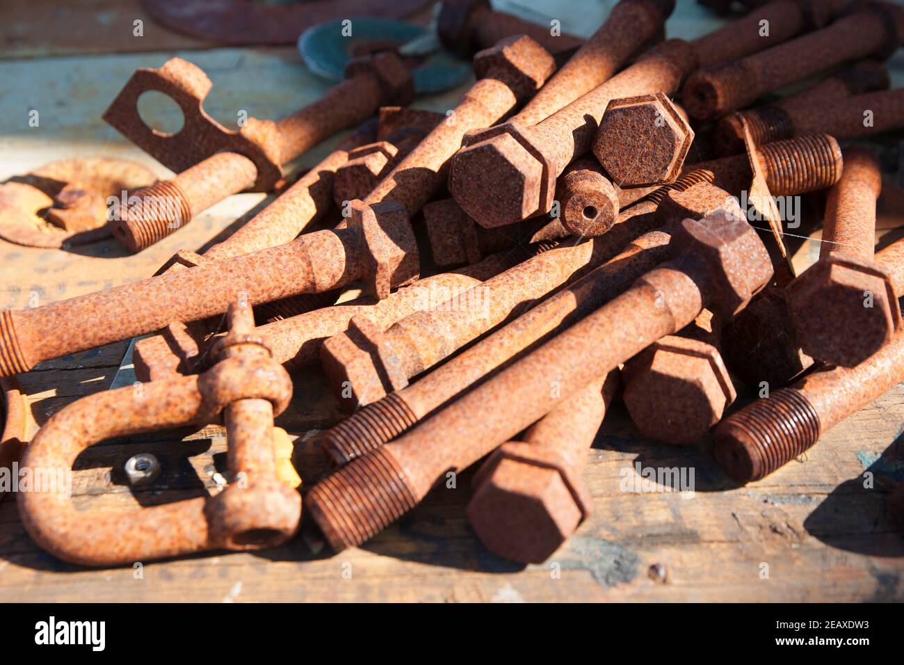 Pile of old rusty nuts and bolts close-up Stock Photo - Alamy