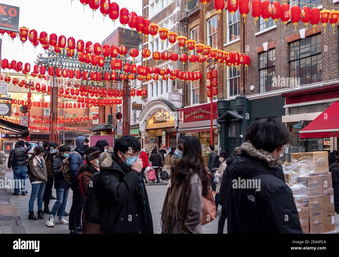 People wearing face masks as a preventive measure against the spread of ...