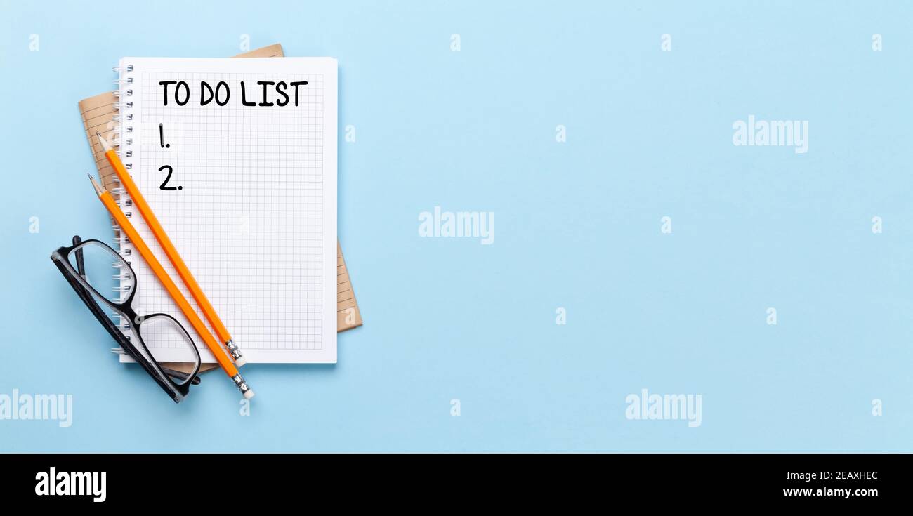 Business desk workplace with to do list notepad and office objects over ...