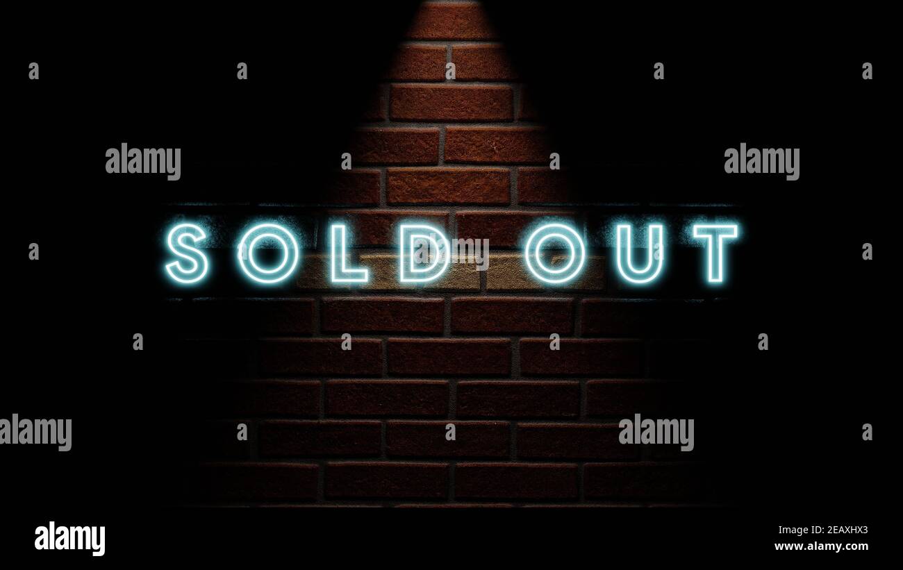 text sold out with effect light blue color in wall brick background ...