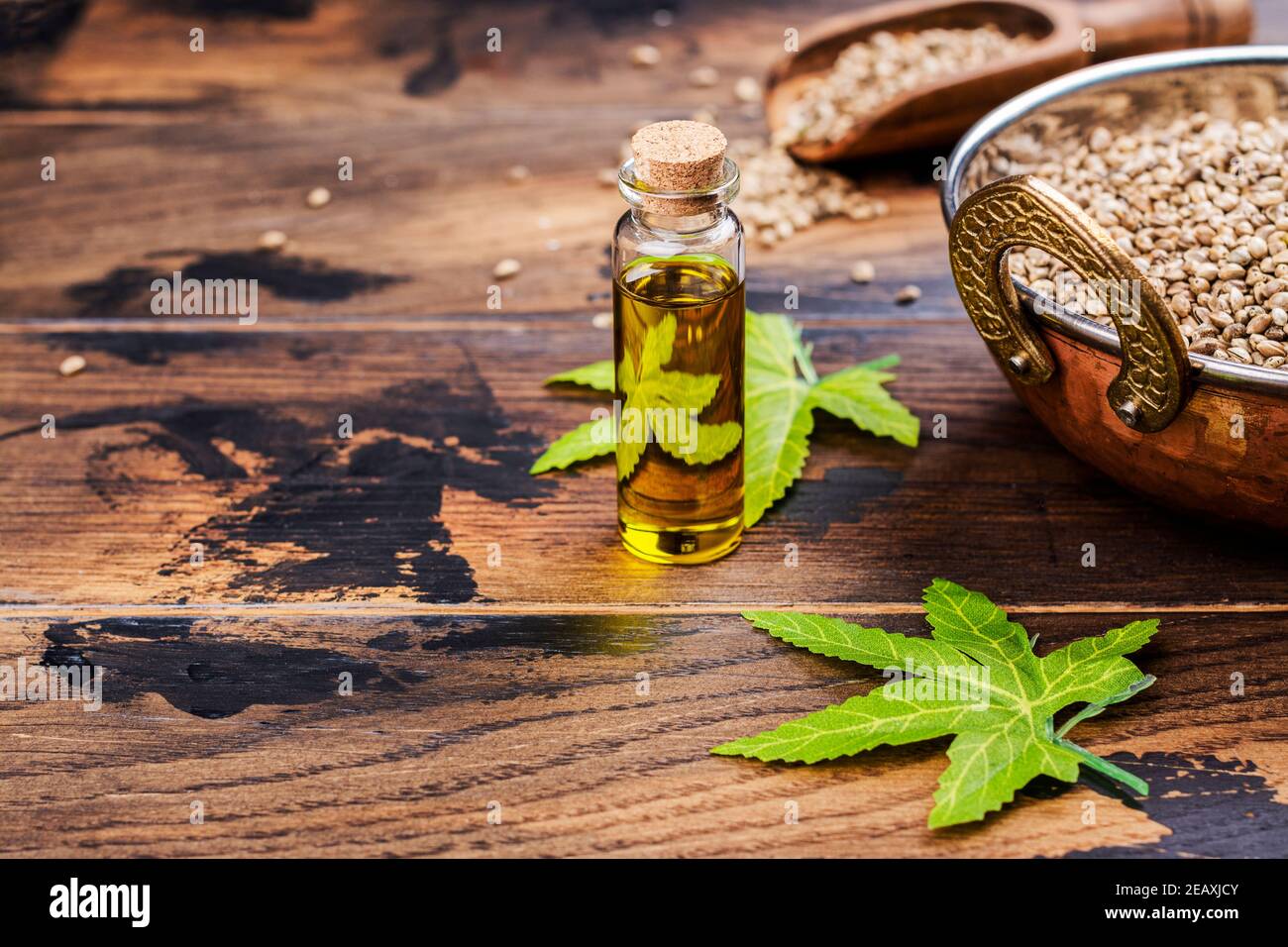 Organic hemp seeds and oil Stock Photo - Alamy