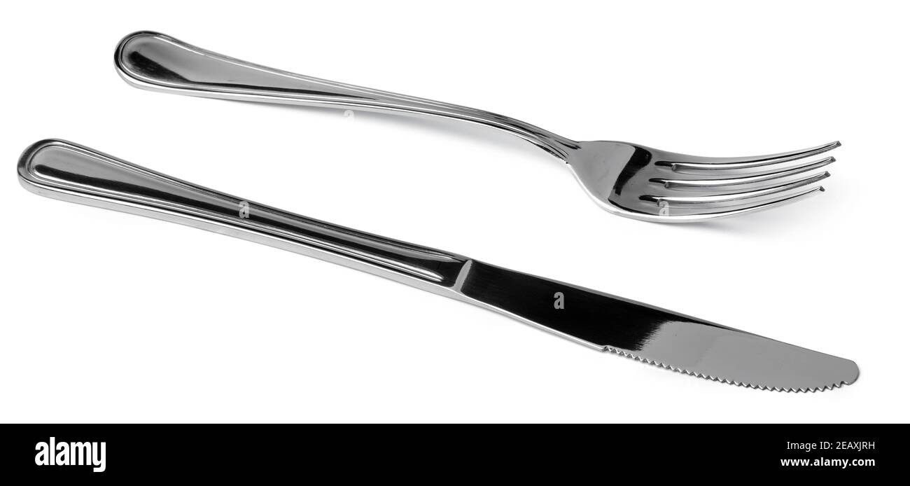 Silver fork and knife isolated on white background Stock Photo - Alamy