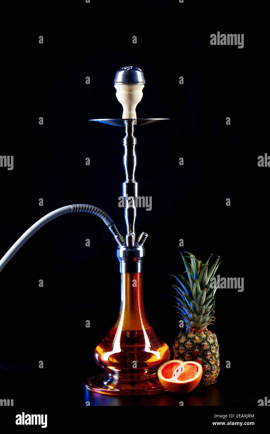 Fruit flavor hookah isolated on black background Stock Photo - Alamy