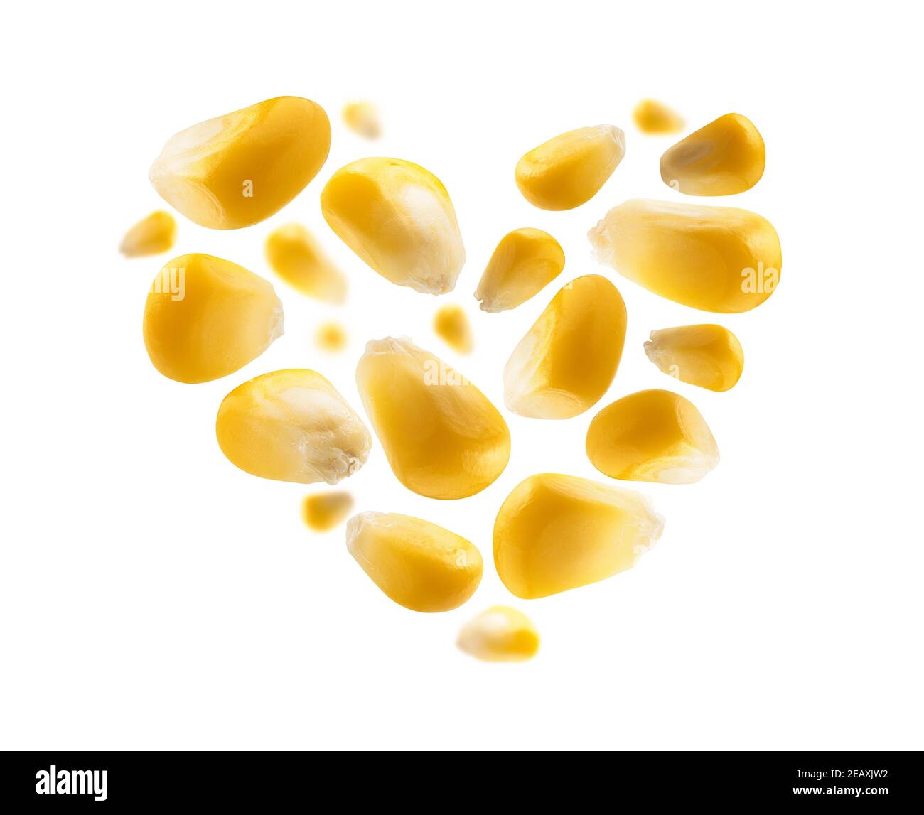 Ripe corn grains in the shape of a heart on a white background Stock ...