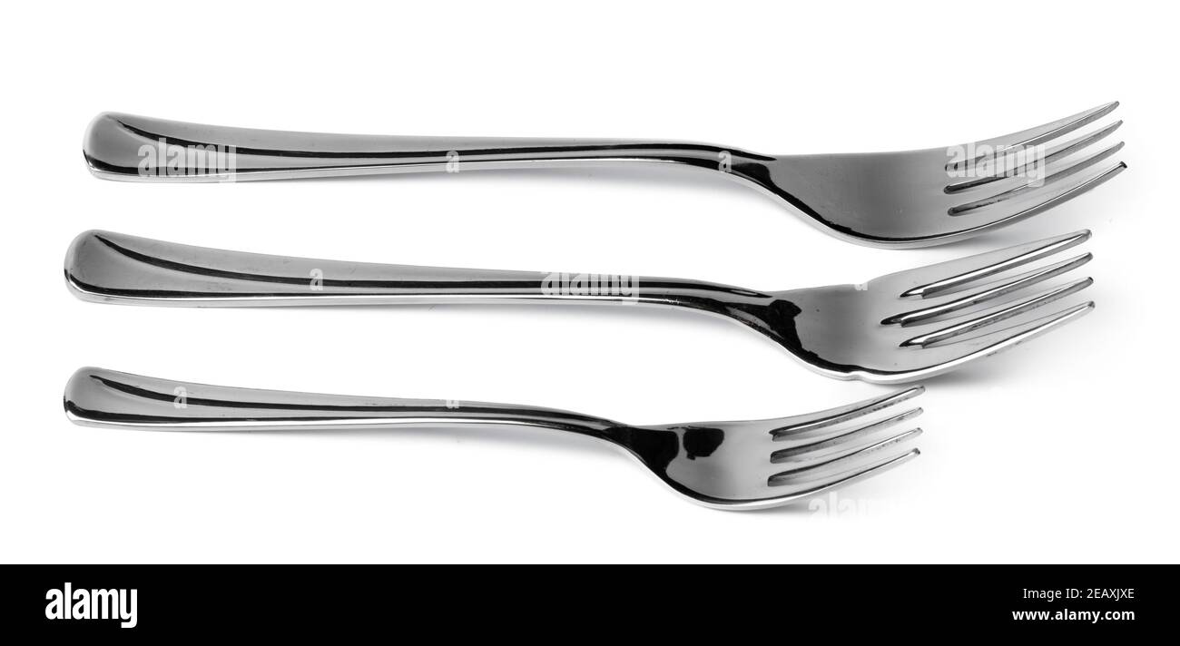 Set of dining forks isolated on white background Stock Photo - Alamy