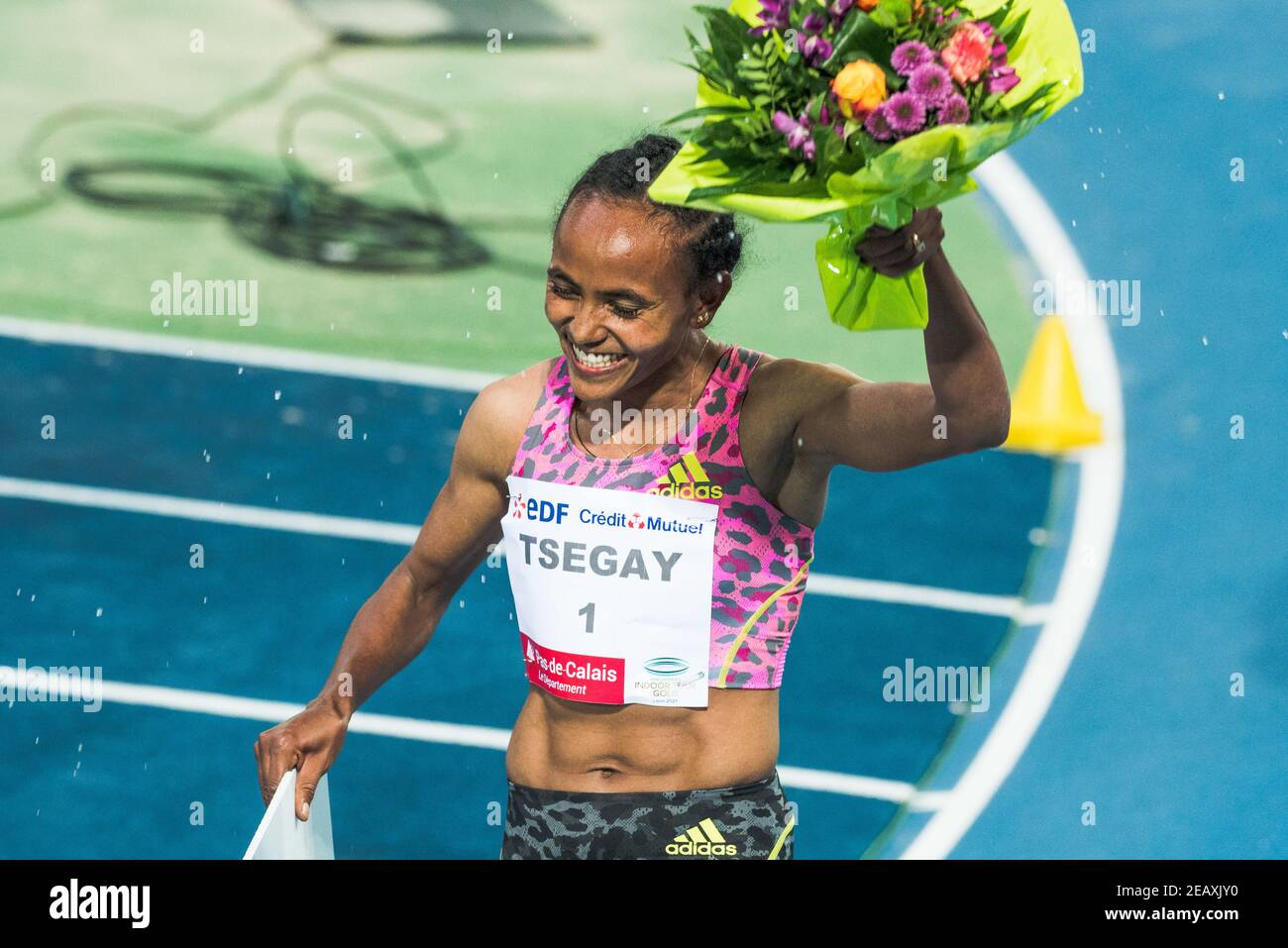 Ethiopian Gudaf Tsegay reacts after winning and breaking the world ...