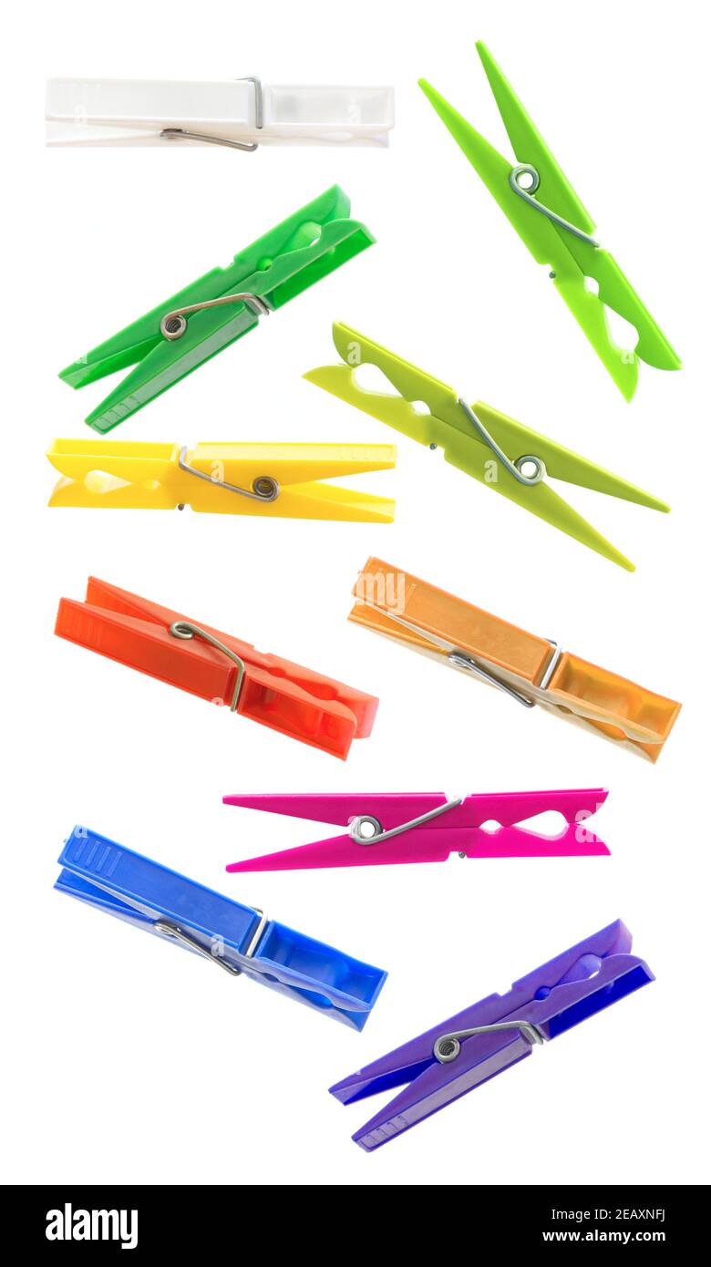 Colorful cloth pegs on white background Stock Photo - Alamy