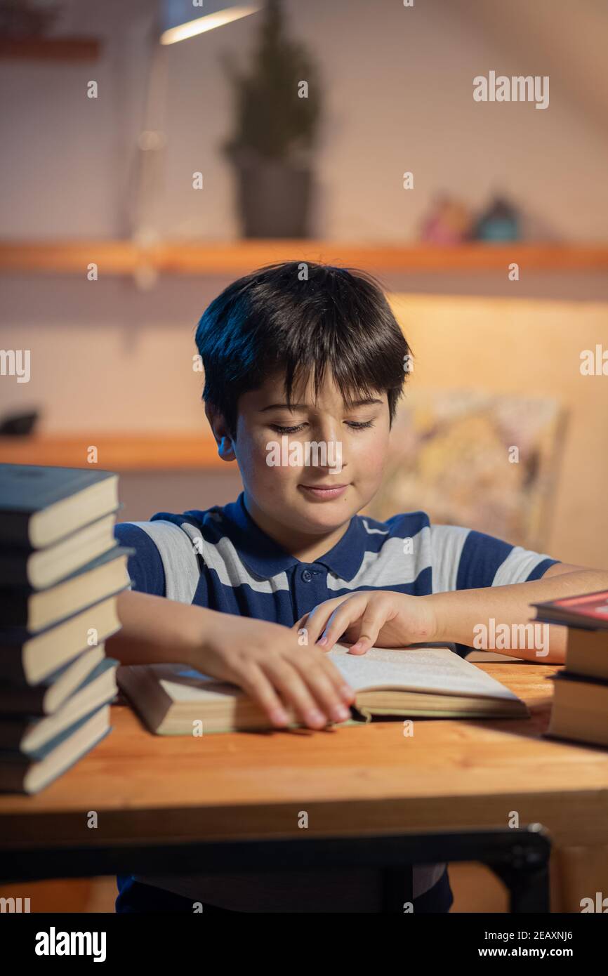 Book under table hi-res stock photography and images - Alamy