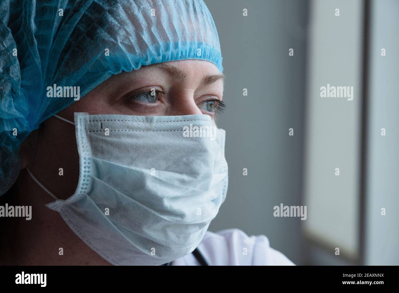 The face of a medical professional close up. medical equipment shows ...