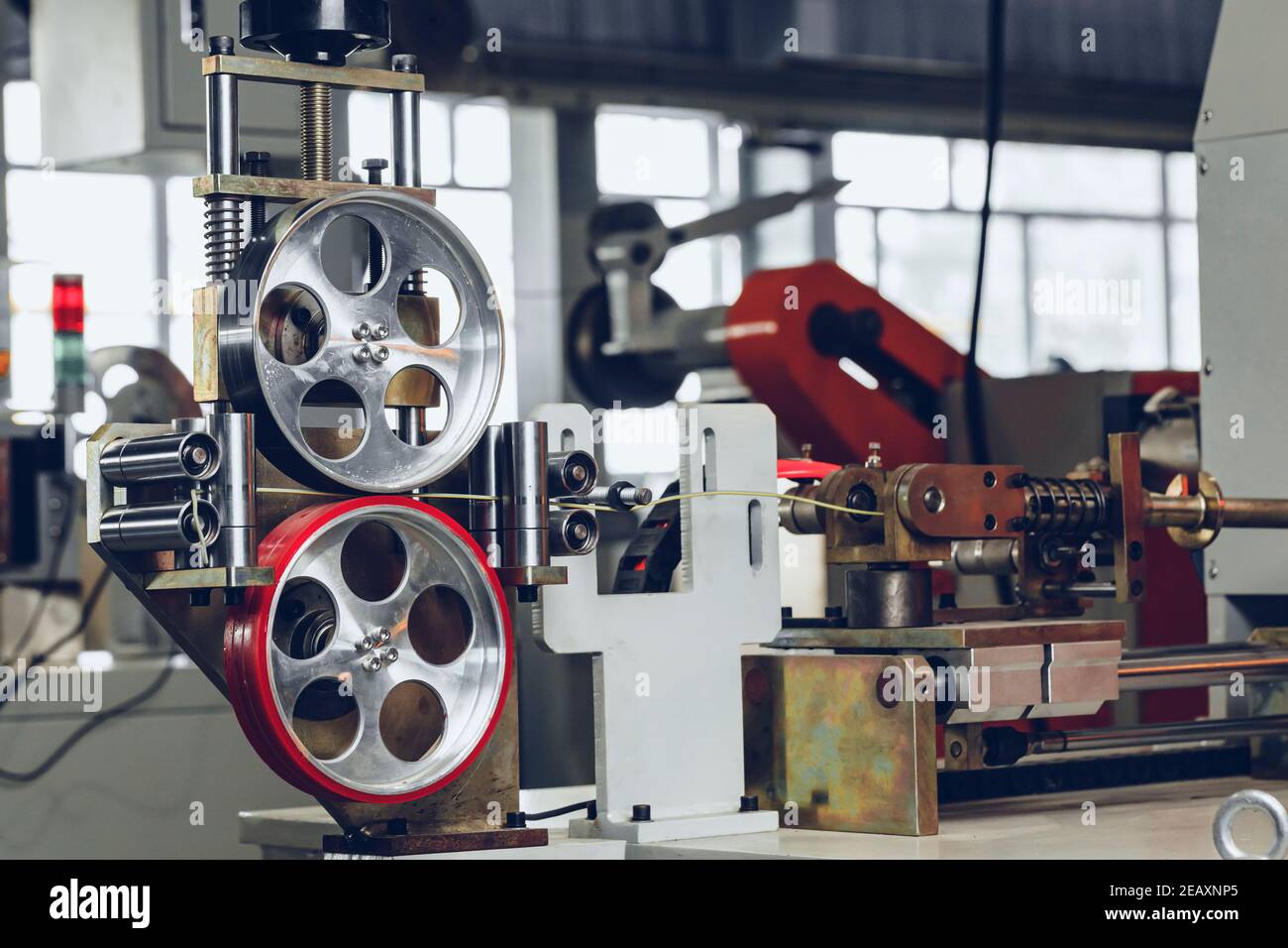 Metal production equipment at the cable plant Stock Photo - Alamy
