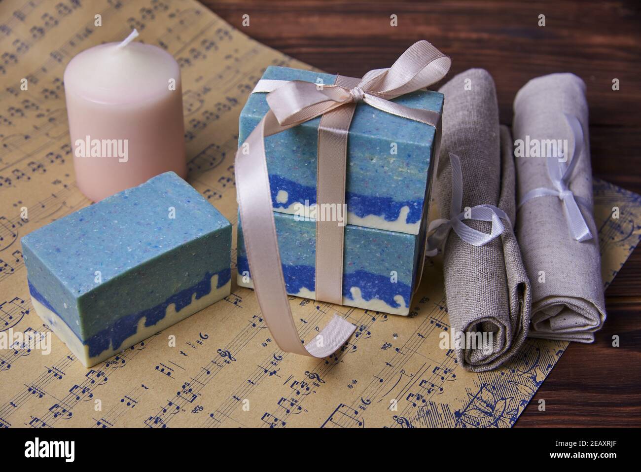 Bright blue organic handmade soap on packaging paper Stock Photo - Alamy