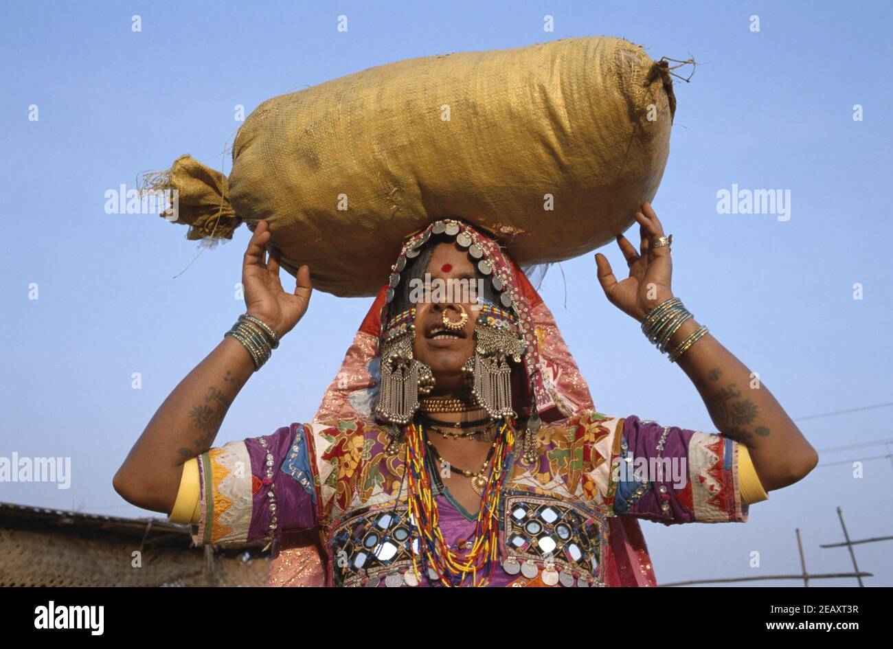 Asia,India, Goa, Gypsy Woman Carrying Sack on Head Stock Photo - Alamy