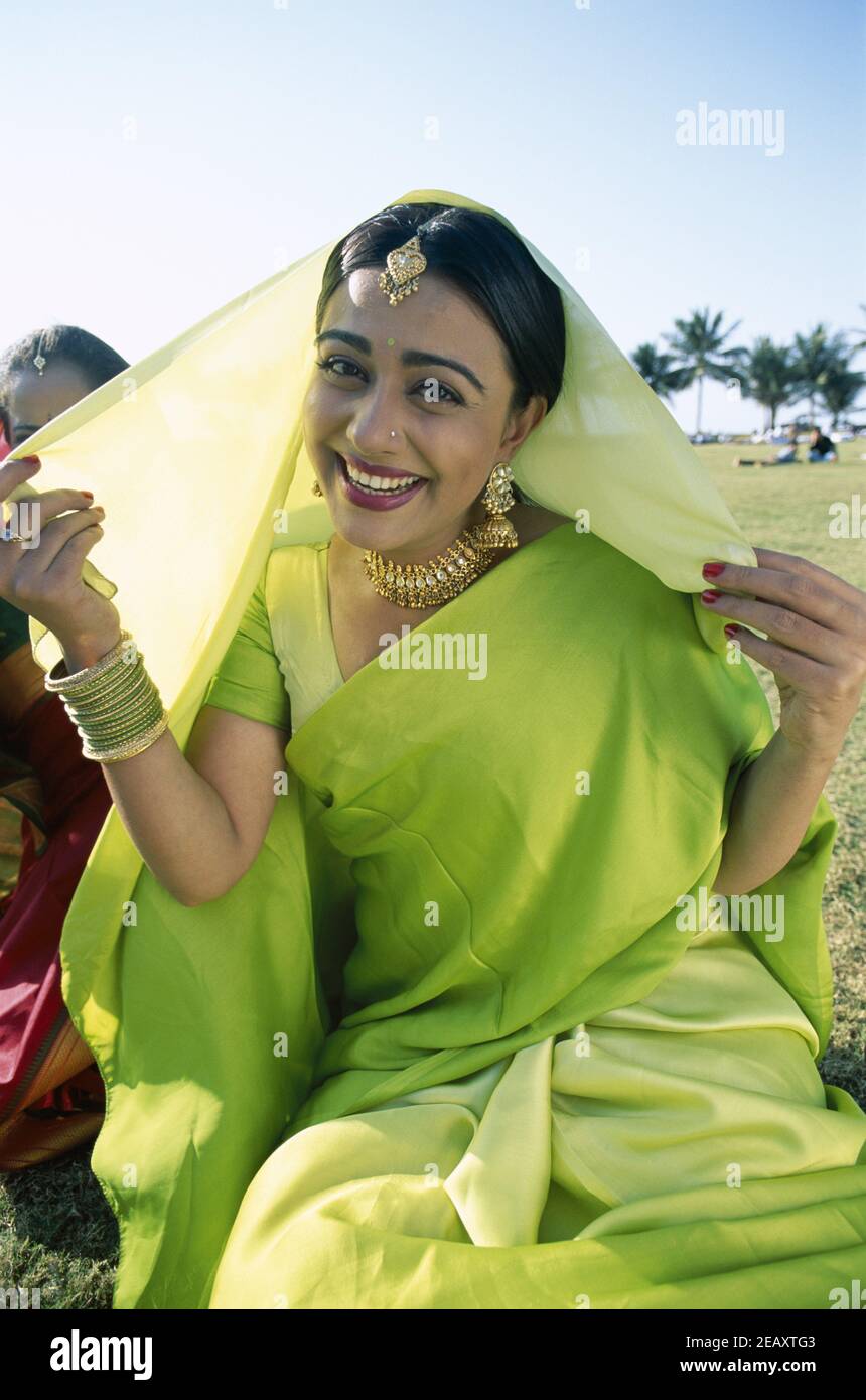 Asia, India, Mumbai, model released portrait of a beautiful smiling ...