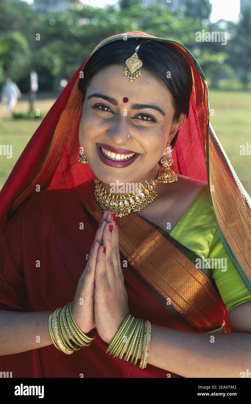 Asia, India, Mumbai, model released portrait of a beautiful smiling ...