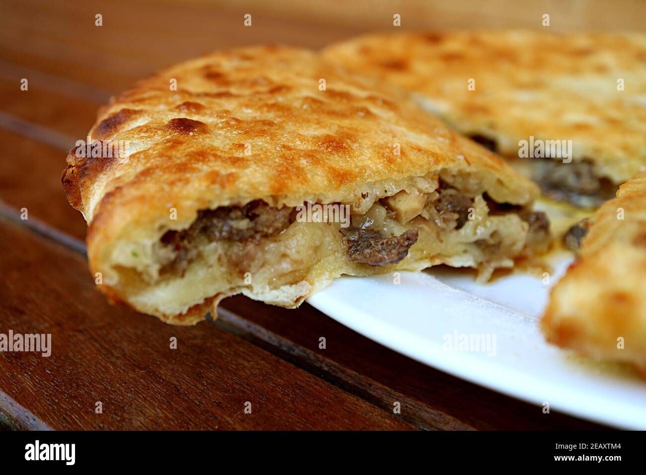 Closeup of a Sliced of Kubdari, Tasty Georgian Flat Bread Stuffed with ...